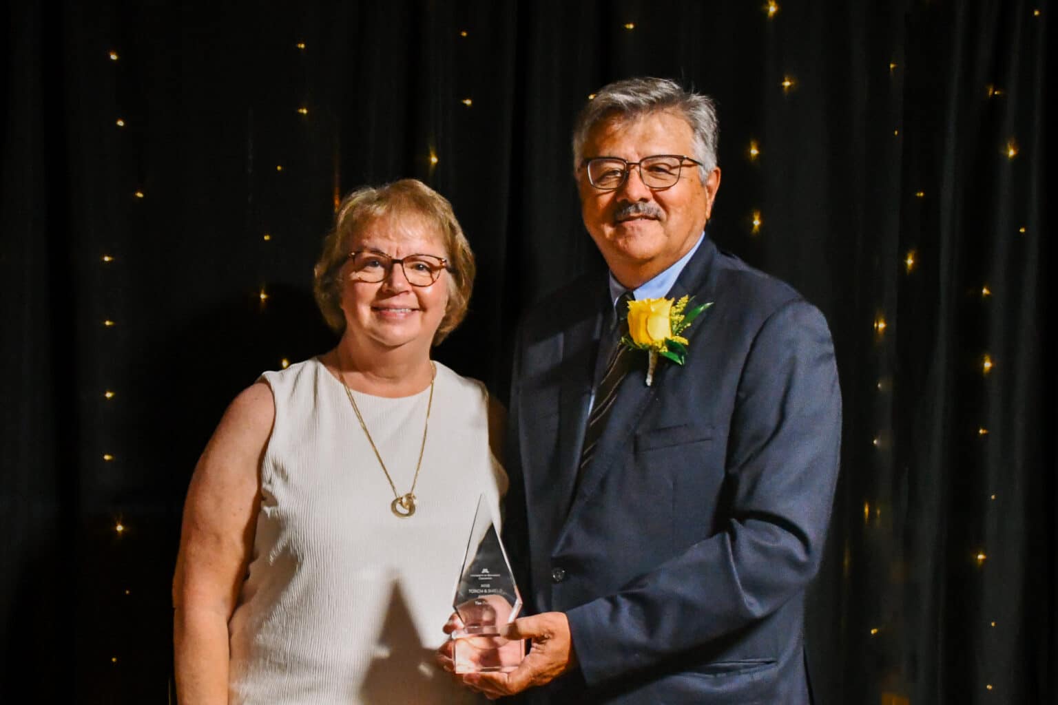 UMC honors Tim Dufault and Paul and Kathy Imle with Torch and Shield ...